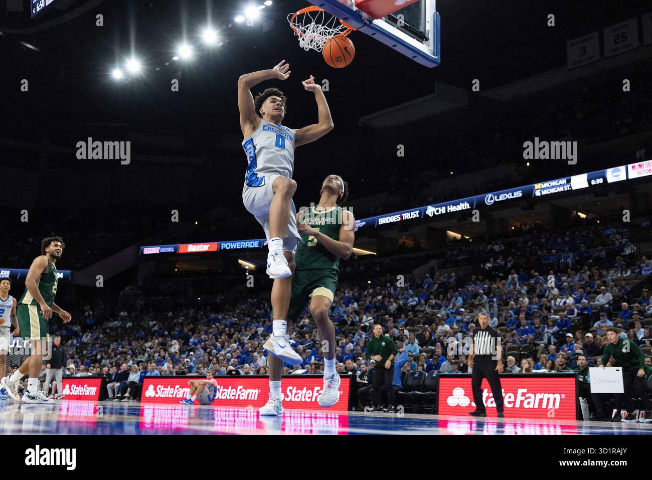 Creighton's Jasen Green (0) dunks against Colorado State's Jon Mekonnen ...