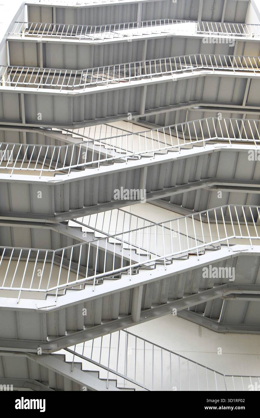 Modern fire escape ladder of gray color Stock Photo - Alamy