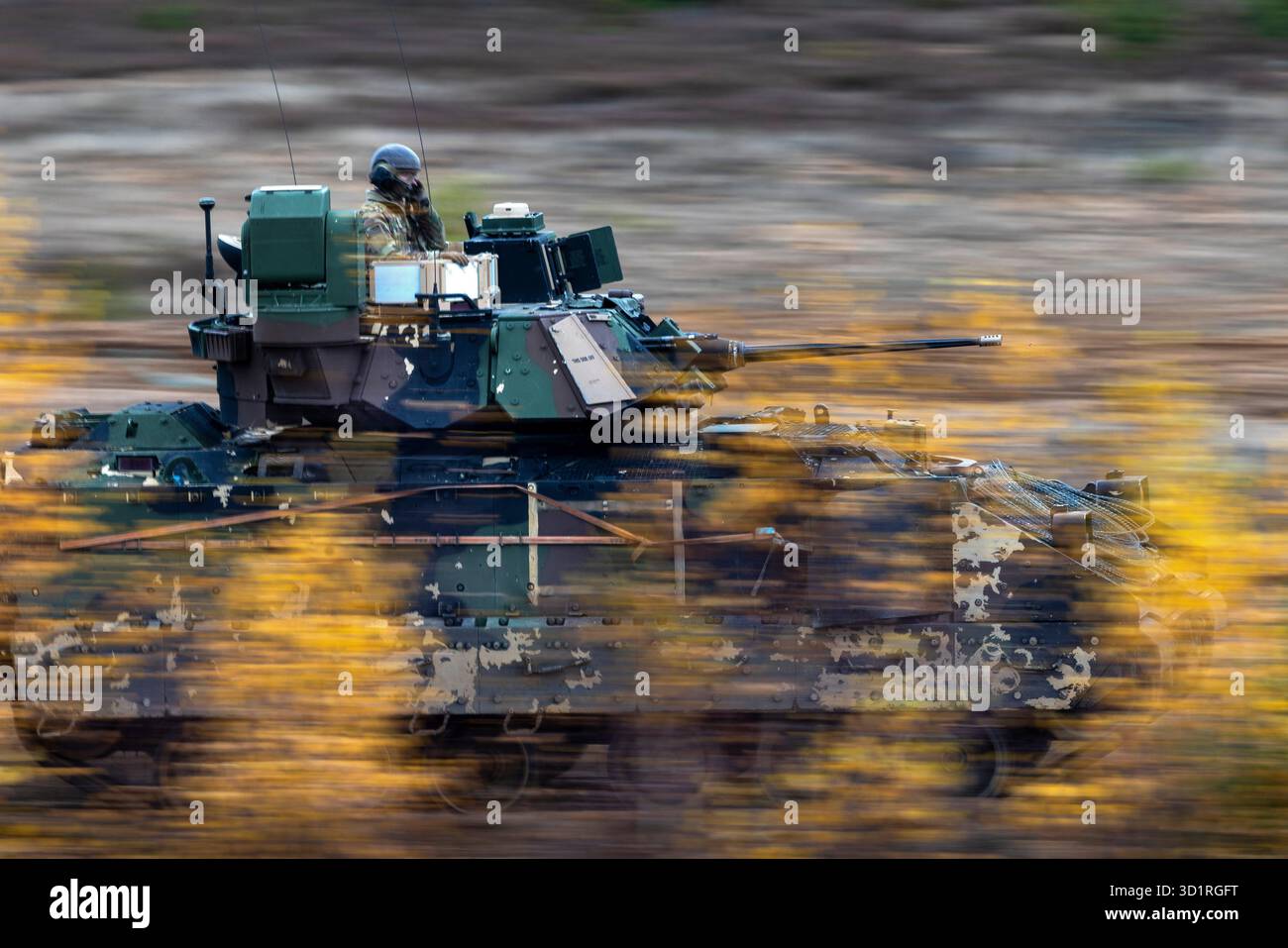 U.S. soldiers ride on an Bradley Fighting Vehicle during a combined ...