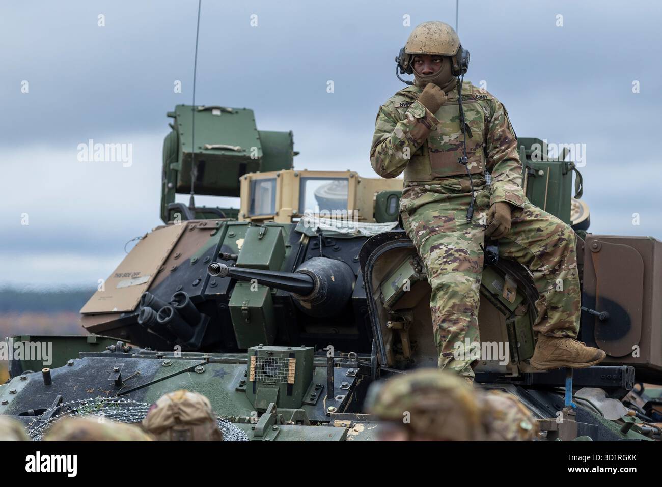 A soldier of the U.S. Army rests during a combined arms live fire ...