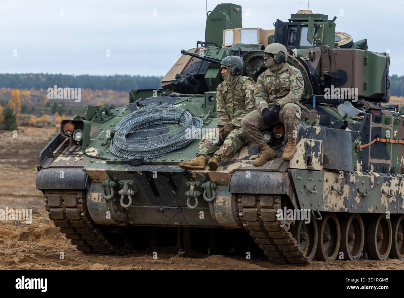 Soldiers of the U.S. Army rest during a combined arms live fire ...