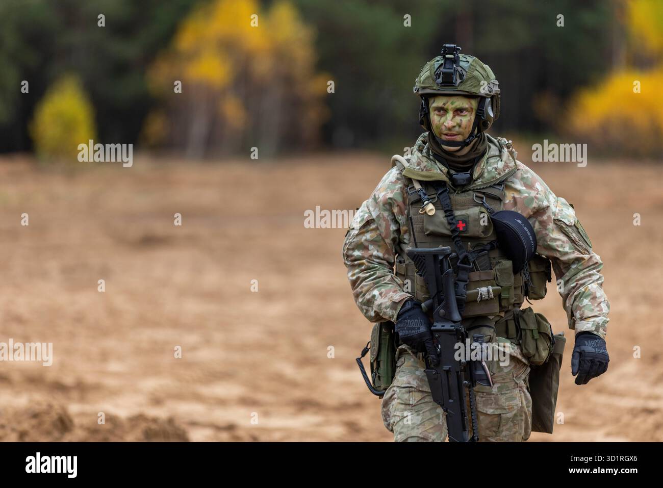 A Lithuanian soldier takes part in the combined arms live fire military ...