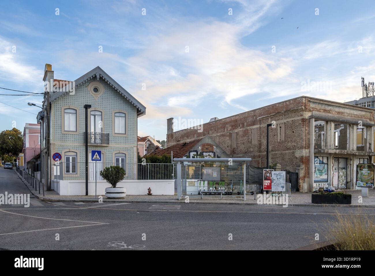 Trafaria, Lisboa - Portugal - 10-01-2024: Street scene with modern bus ...