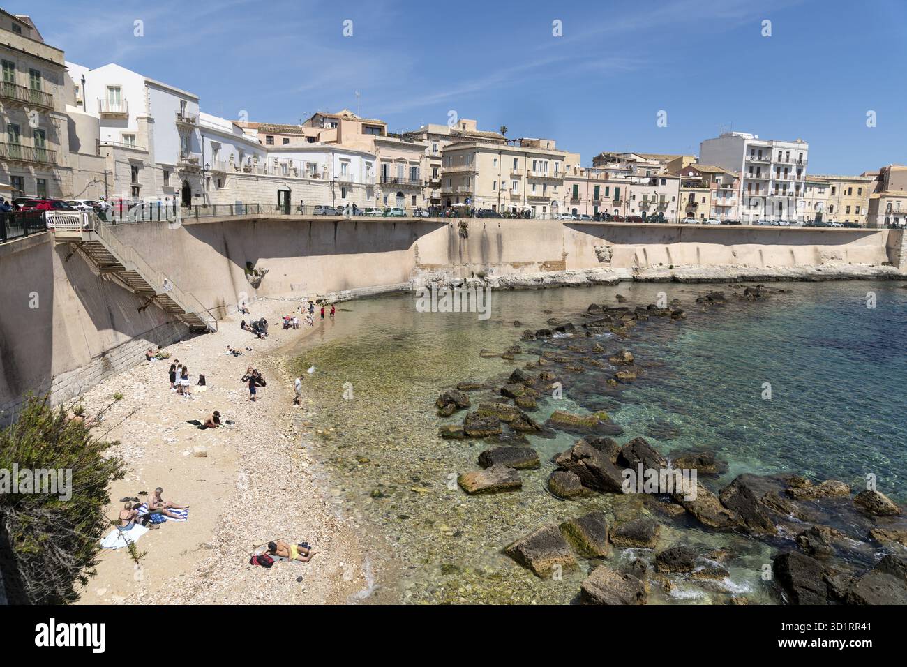 Syrakus, Sizilien - Italy - 04-09-2025: Small beach in Syracuse with ...