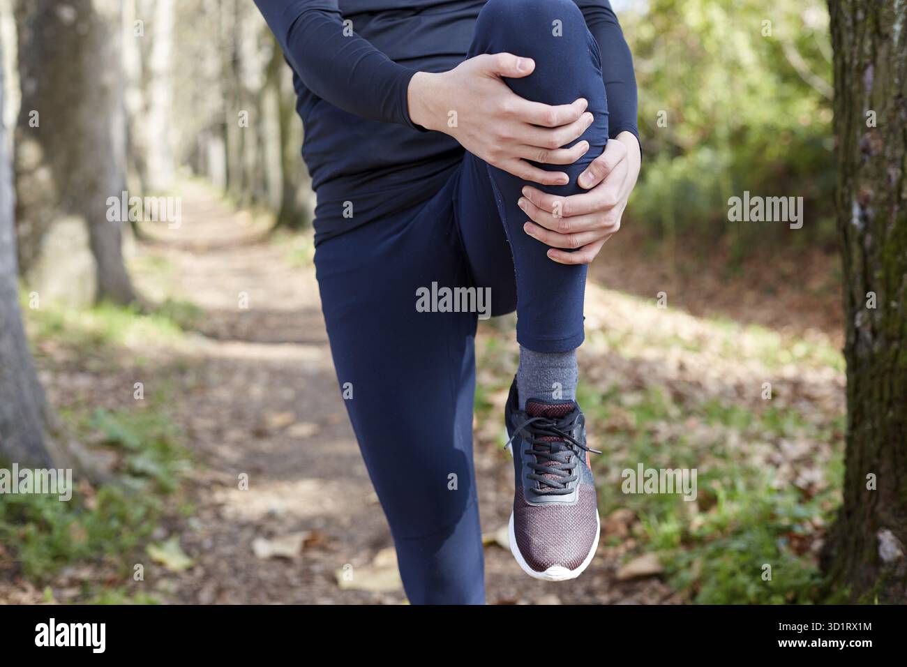 Knee Injury - sports running knee injuries on woman. Male runner with ...