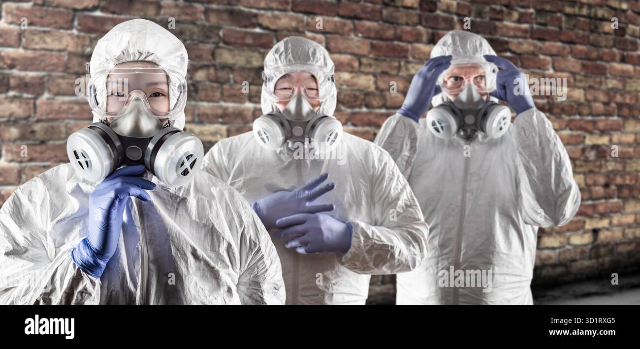 Chinese and Caucasian Woman and Men In Gas Masks, Goggles and Hazmat ...