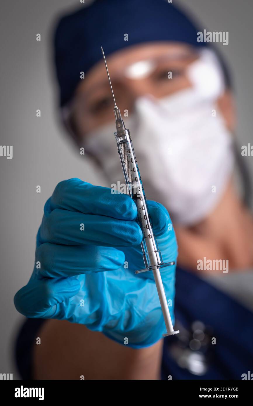 Doctor or Nurse Holding Medical Syringe with Needle Stock Photo - Alamy