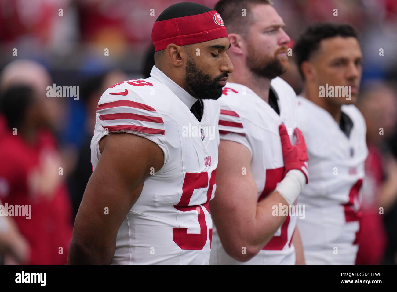 San Francisco 49ers linebacker Curtis Robinson (59) and teammates stand ...