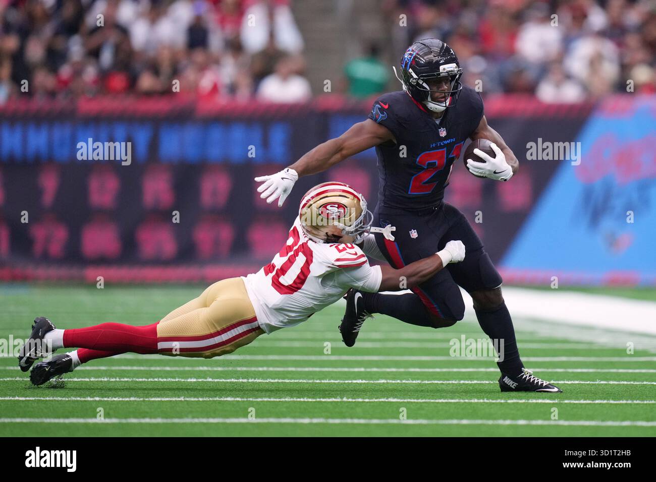 Houston Texans running back Nick Chubb (21) his hit by San Francisco ...