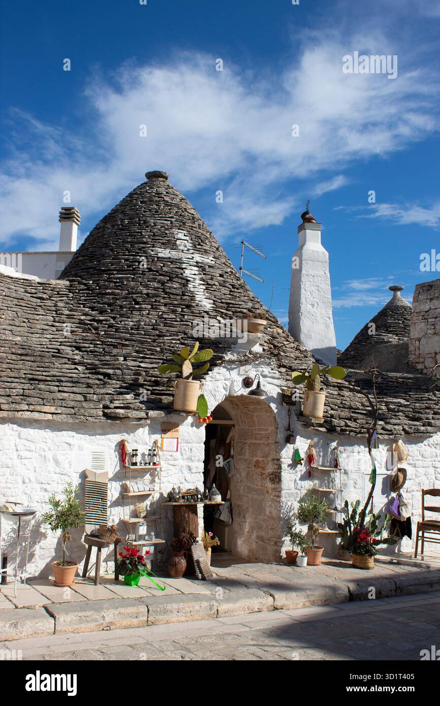 Traditional trulli houses in Alberobello, Apulia, Italy, featuring ...