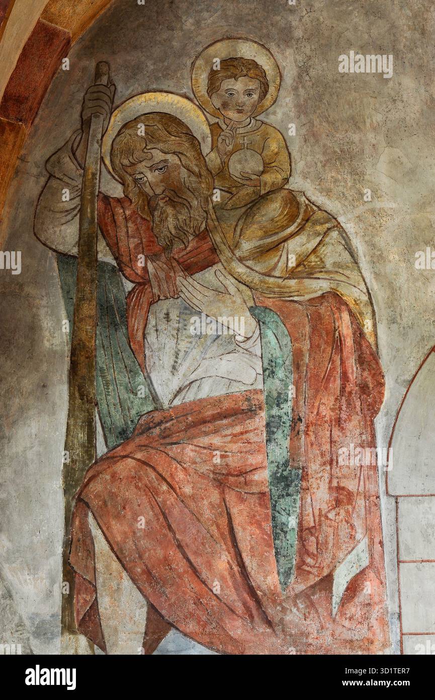 Saint Christopher carries the Christ Child - and the added burden of ...