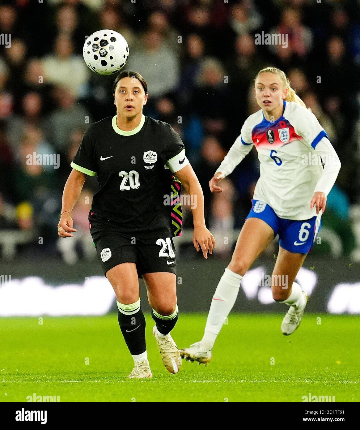 Australia's Samantha Kerr (left) and England's Esme Morgan battle for ...