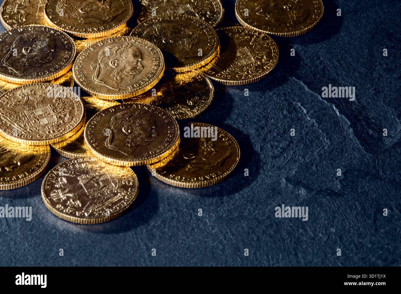 Austrian Gold Ducats Franz Joseph on Black Background Stock Photo - Alamy
