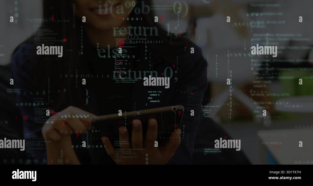 Analyzing code, developer wearing dark top using tablet at office desk ...