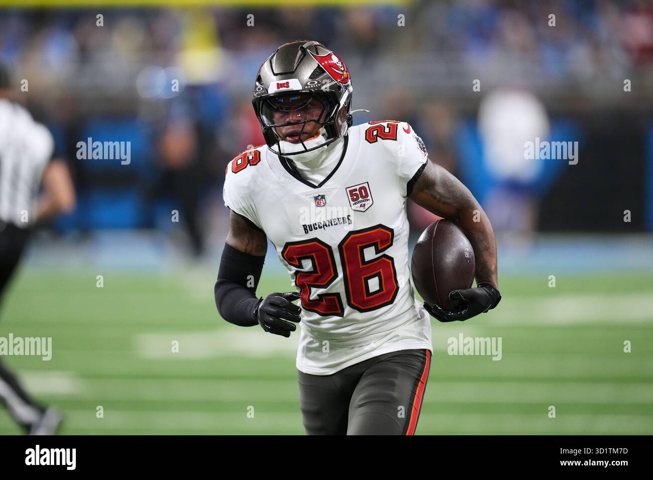 Tampa Bay Buccaneers safety Kaevon Merriweather (26) runs the ball ...