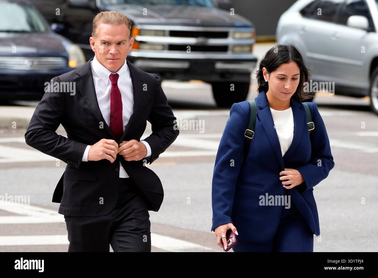 Former Green Beret Jordan Goudreau, left, walks to the United States ...