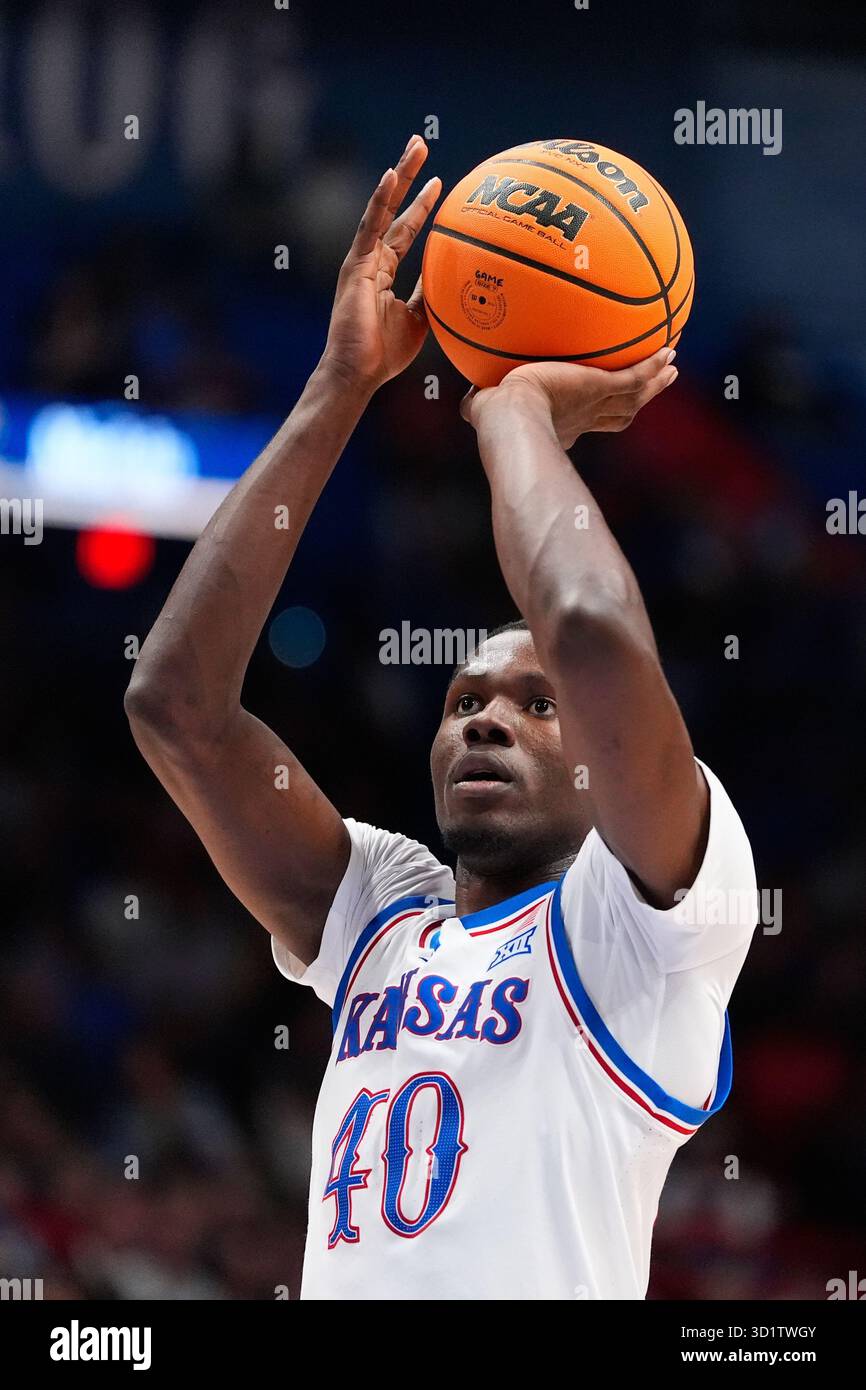 Kansas forward Flory Bidunga shoots during the first half of an ...