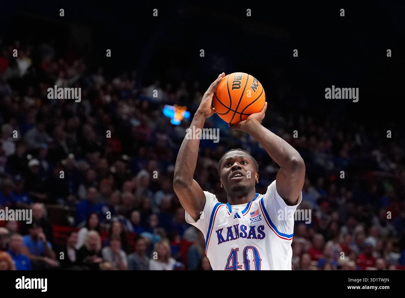Kansas forward Flory Bidunga shoots during the first half of an ...