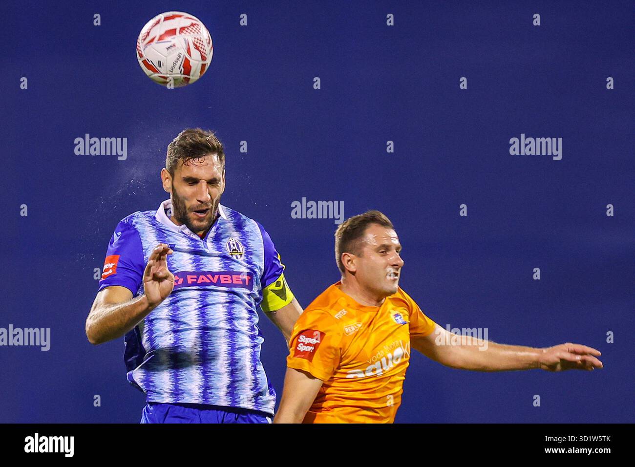 Marko Vesovic of Lokomotiva and Dejan Glavica of Varteks in action ...
