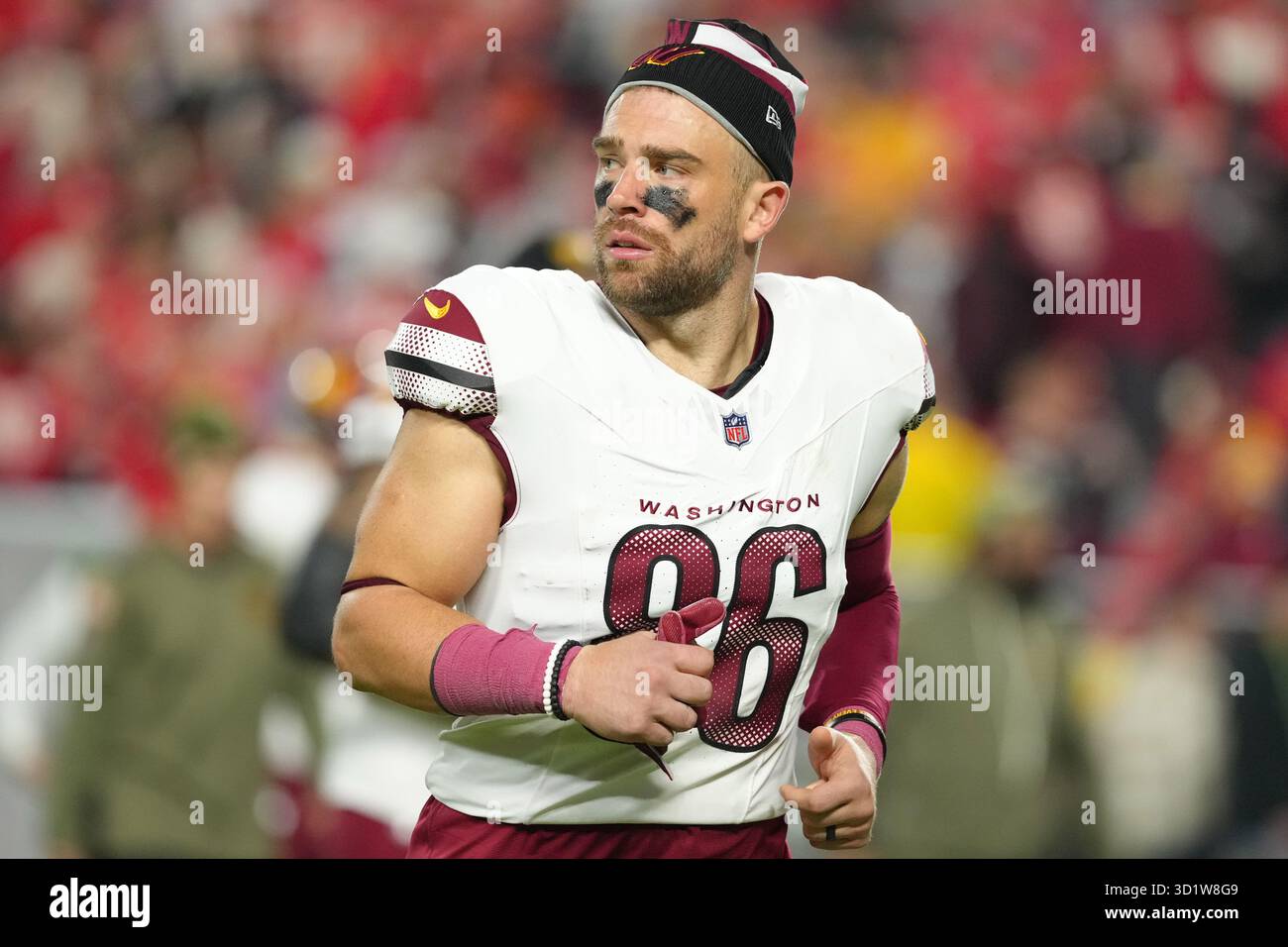 Washington Commanders tight end Zach Ertz runs off the field against ...