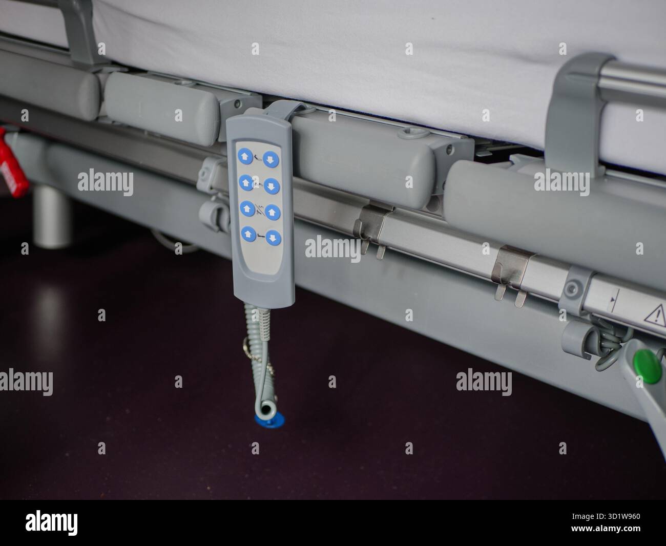 Modern hospital bed control panel close-up with adjustment buttons for ...