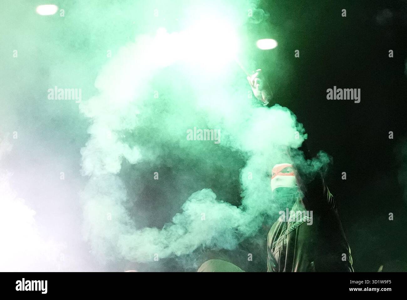 Celtic fans set off flares as they protest against the board outside ...