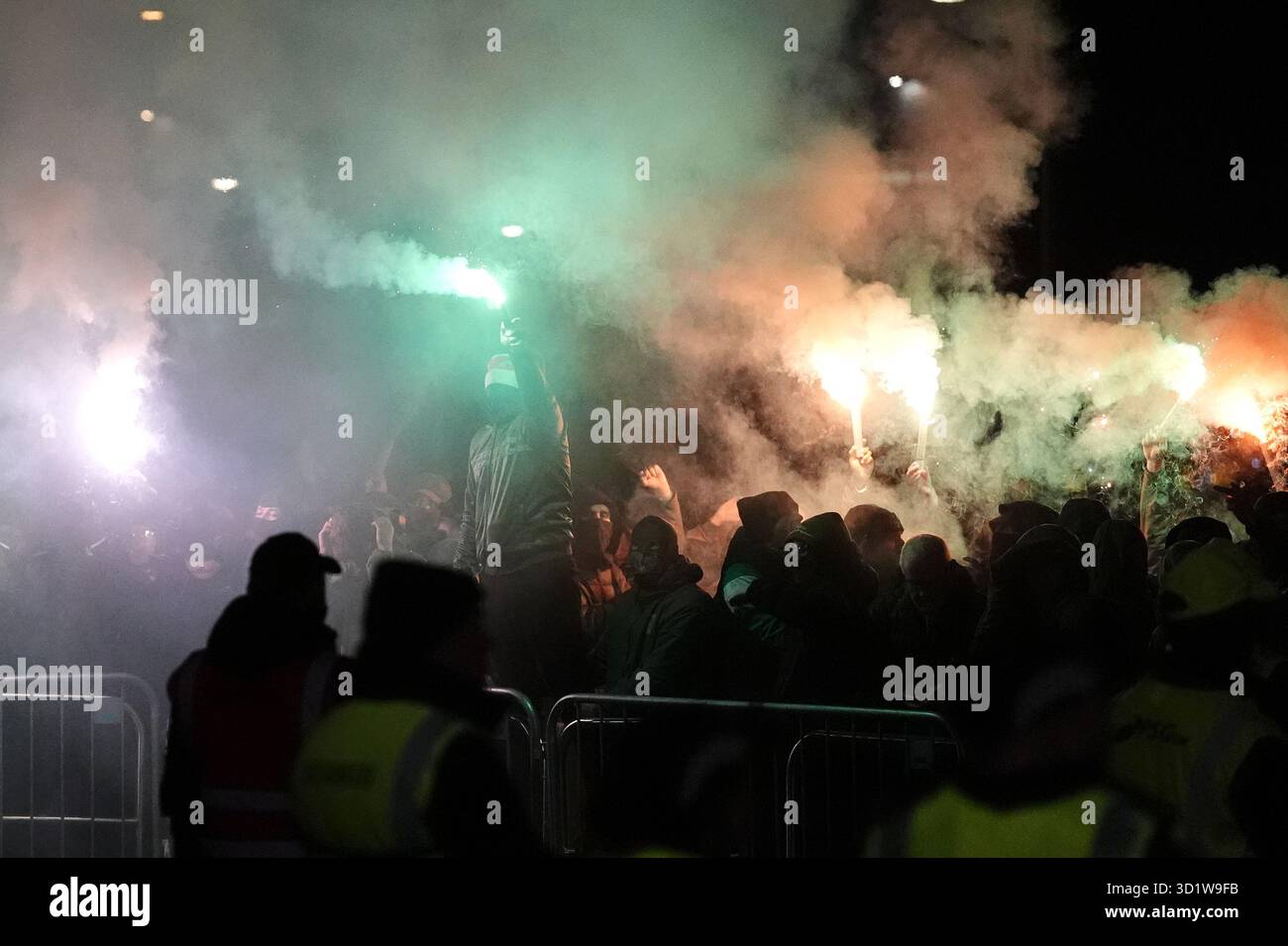 Celtic fans set off flares as they protest against the board outside ...