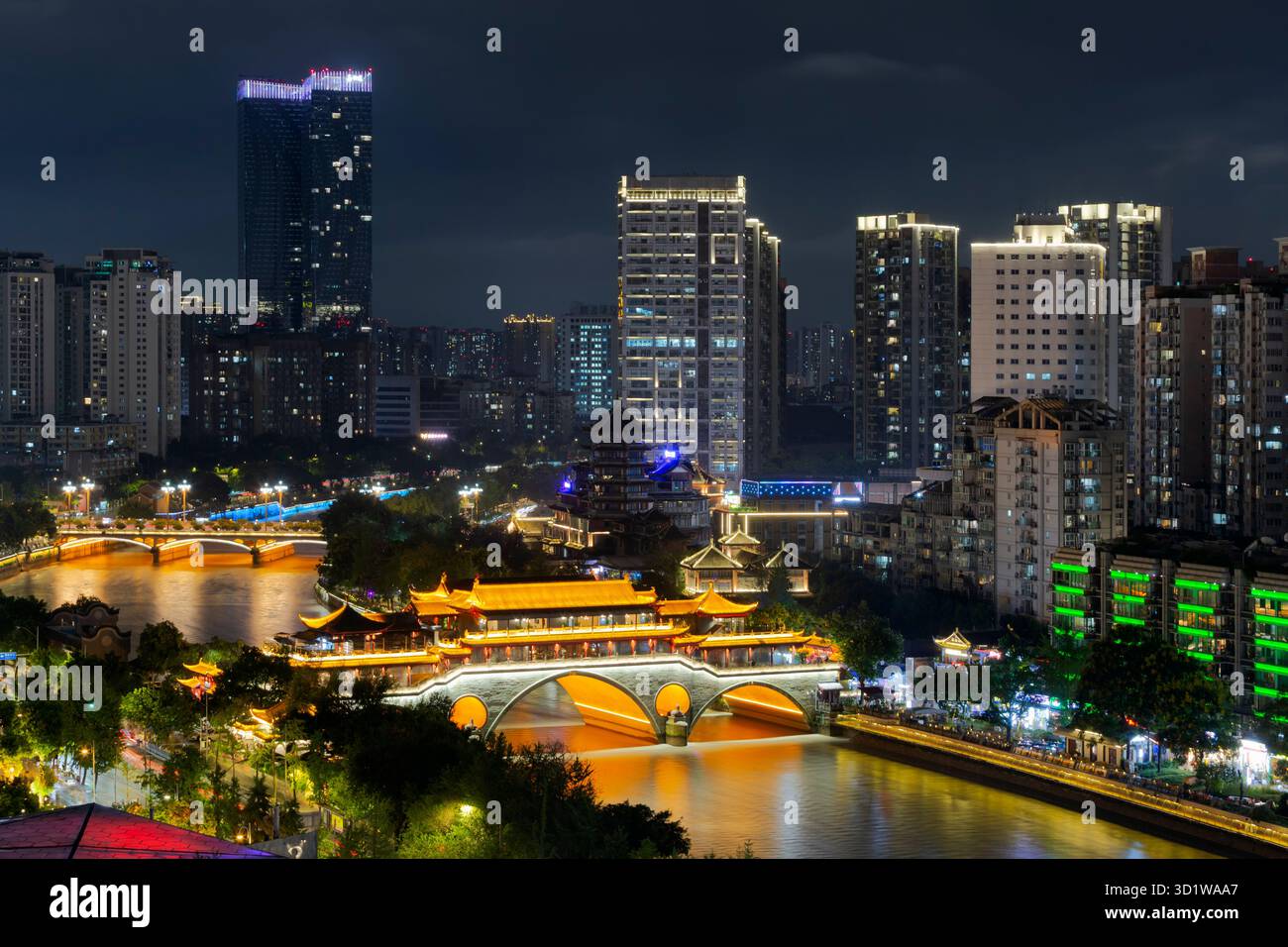 Night view of Anshun Bridge with beautiful illumination and reflection ...