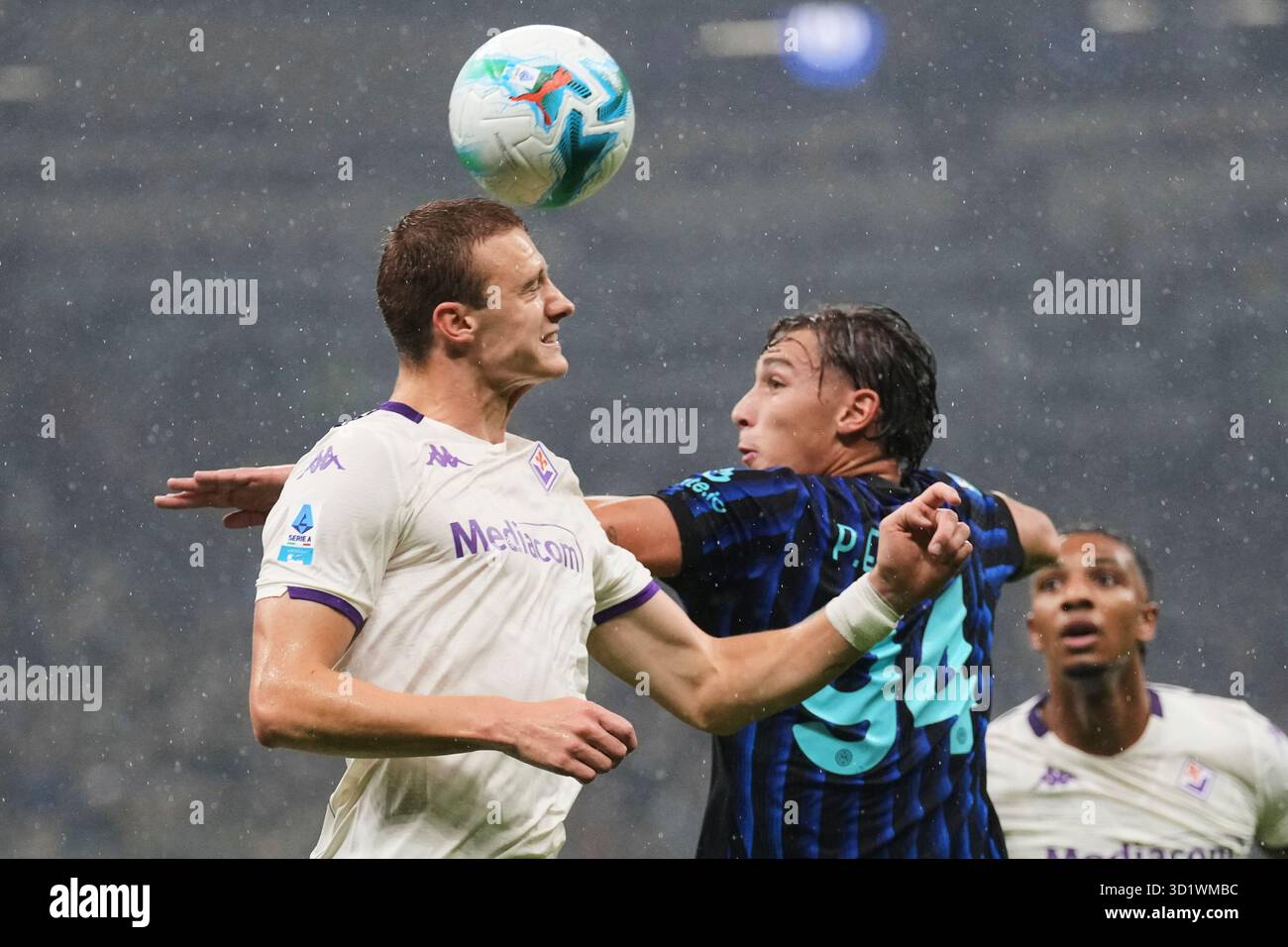 Inter Milan's Francesco Pio Esposito goes for the header with ...