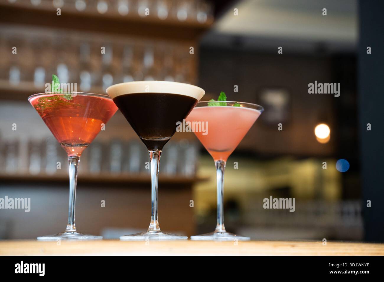 Three Elegant Cocktails in Martini Glasses Stock Photo - Alamy