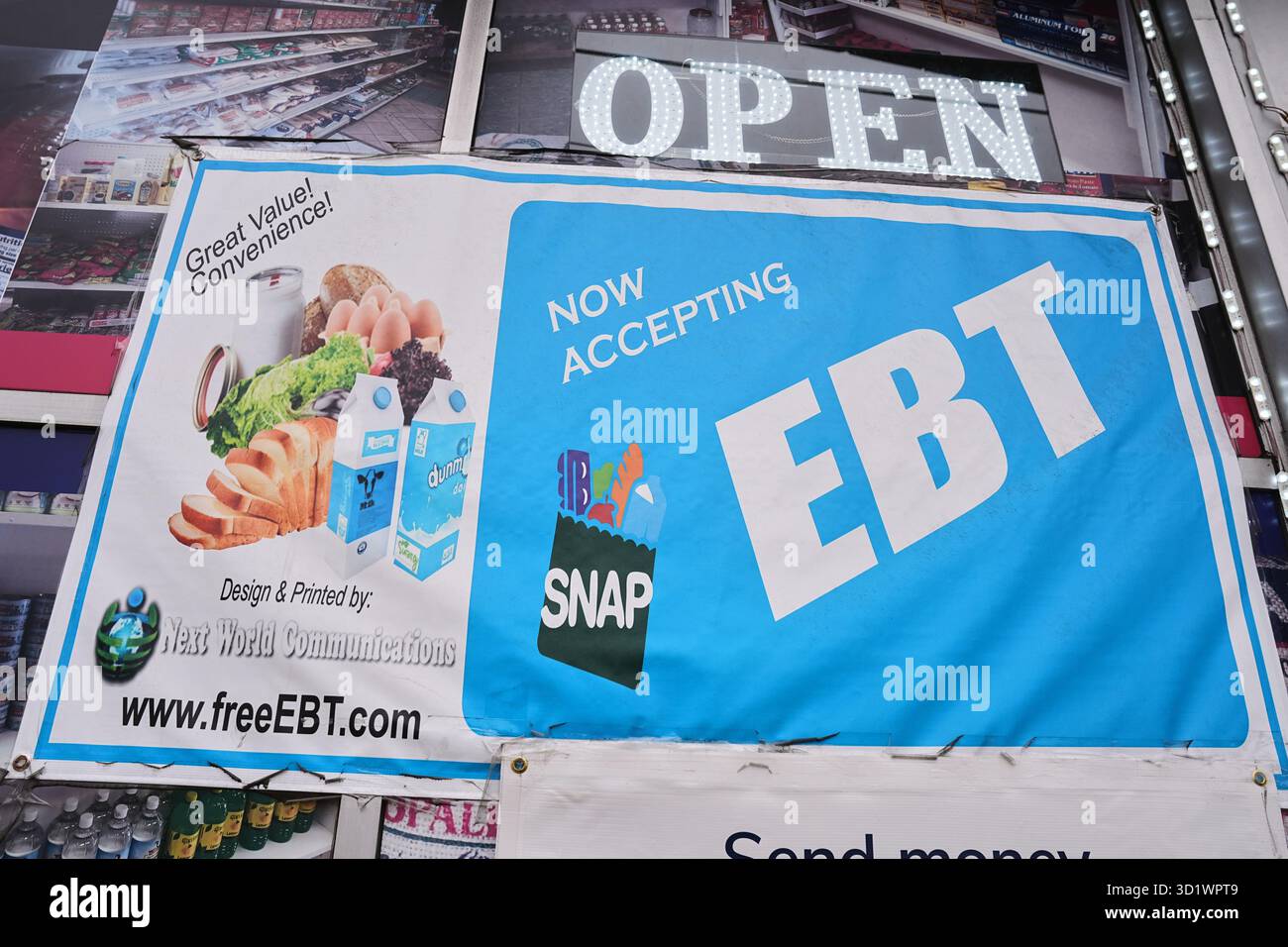An EBT payments acceptance sign is posted at a grocery store in ...