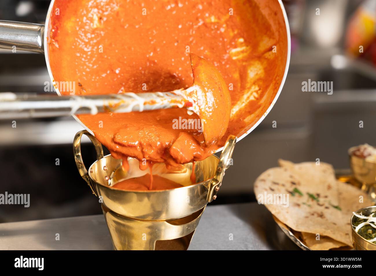Golden pot pouring indian hi-res stock photography and images - Alamy