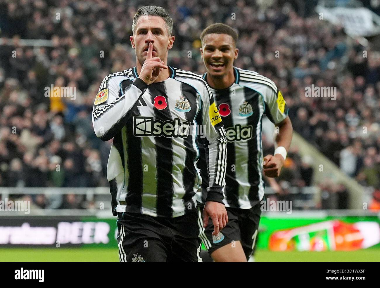 Newcastle United's Fabian Schar (left) celebrates scoring their side's ...