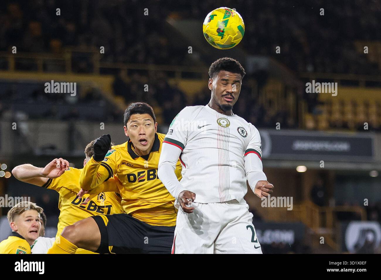 11, Hee-chan Hwang of Wolverhampton Wanderers & 21, Jorrel Hato of ...