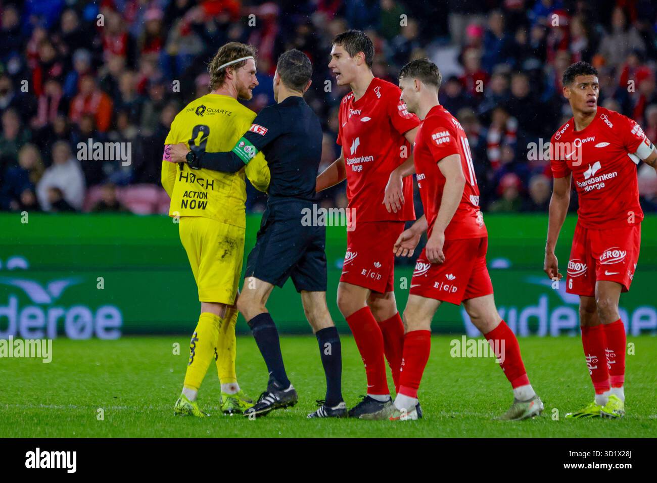 Bergen 20251029. Bodø/Glimt's Kasper Høgh and referee Tore Hansen in ...