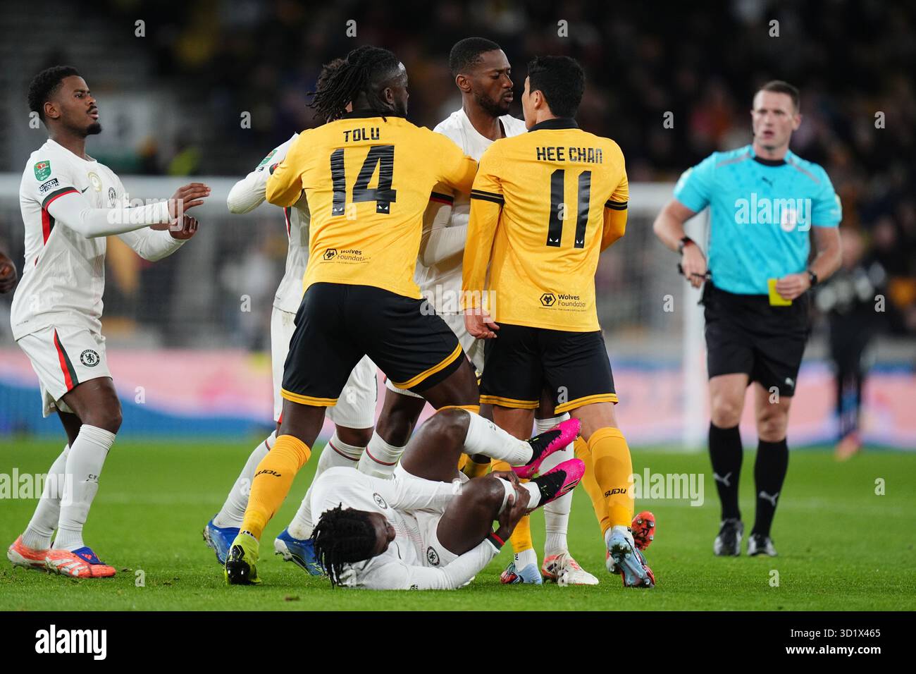 Wolverhampton Wanderers' Hwang Hee-Chan (second from right) clashes ...