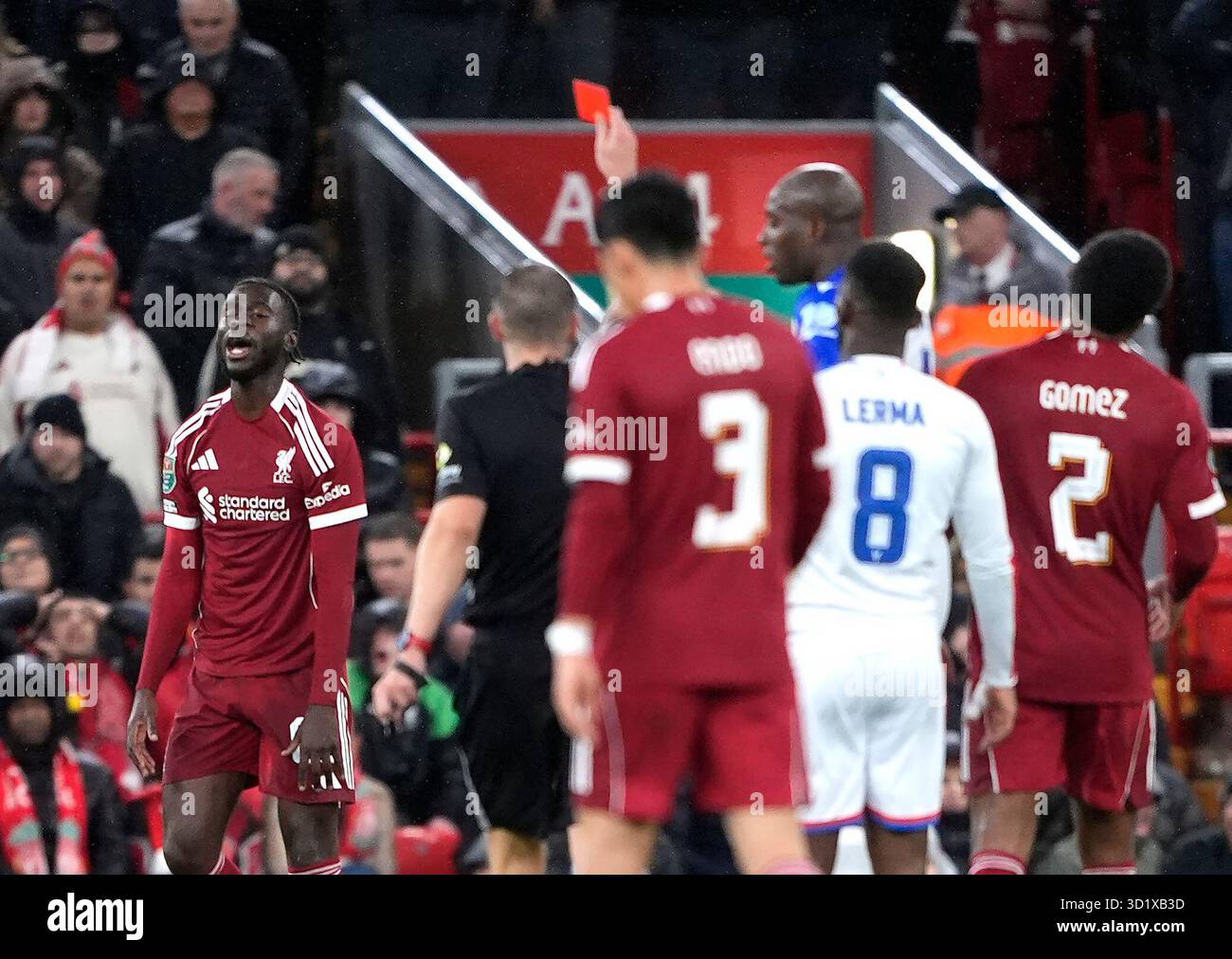 Referee Craig Pawson shows Liverpool's Amara Nallo a red card during ...