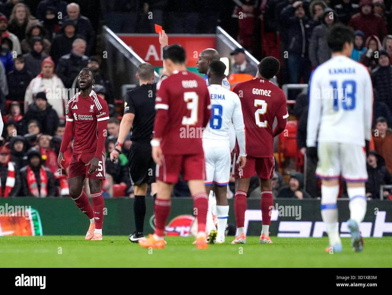 Referee Craig Pawson shows Liverpool's Amara Nallo a red card during ...