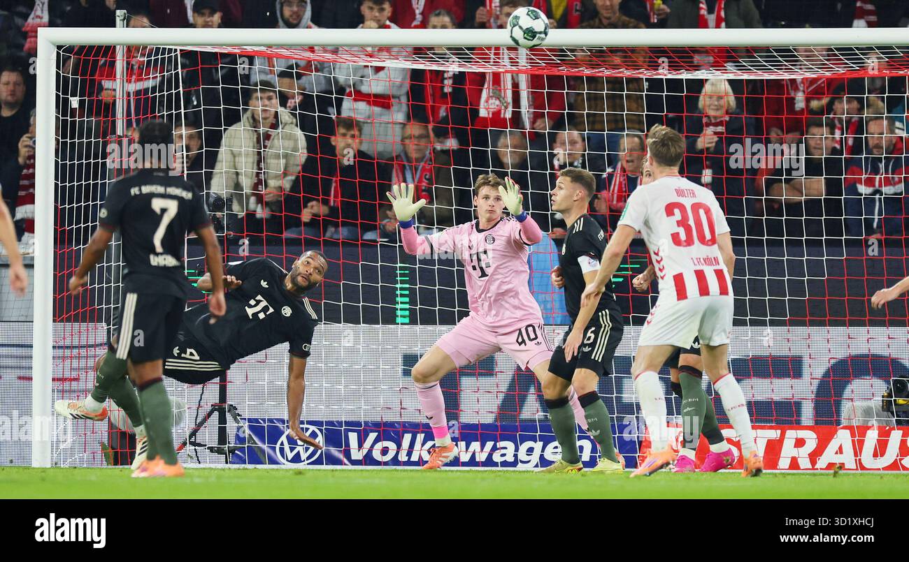 from left: Jonathan Tah, goalkeeper Jonas Urbig (Bayern), Joshua ...