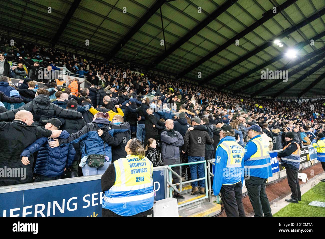 Manchester City fans do the Poznan during the Carabao Cup Last 16 ...