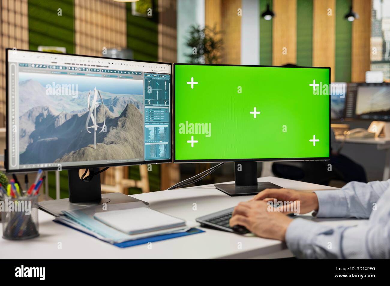Technician using green screen PC to evaluate next generation wind ...