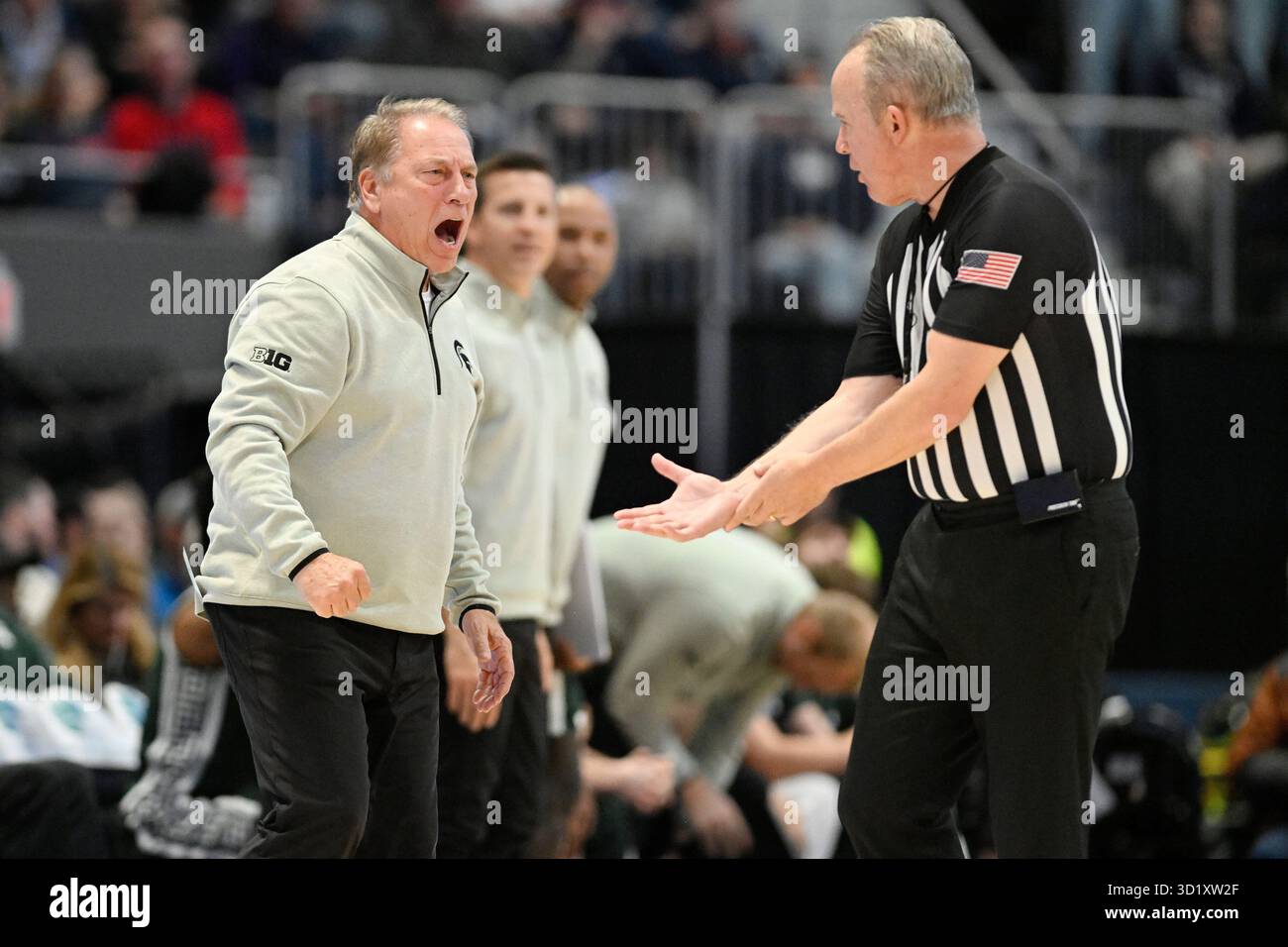 Michigan State head coach Tom Izzo, left, reacts toward referee John ...