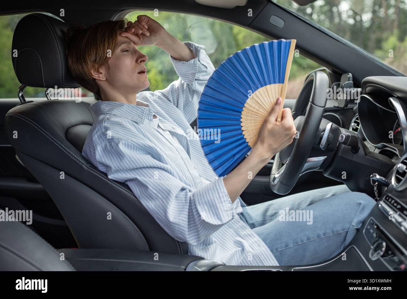 Tired woman fan suffers hi-res stock photography and images - Alamy