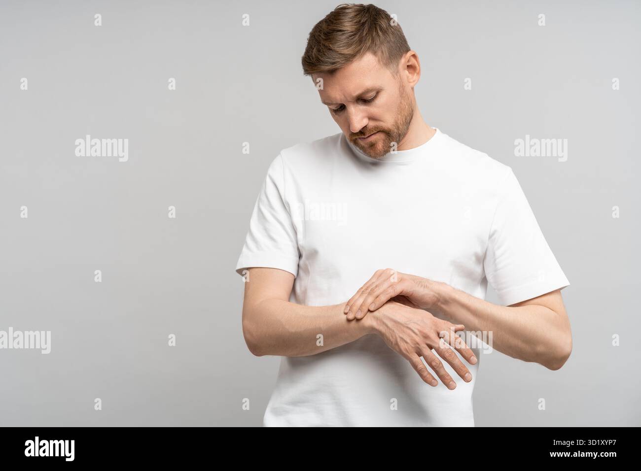 Unpleased man suffer from tunnel syndrome due to prolonged use of ...