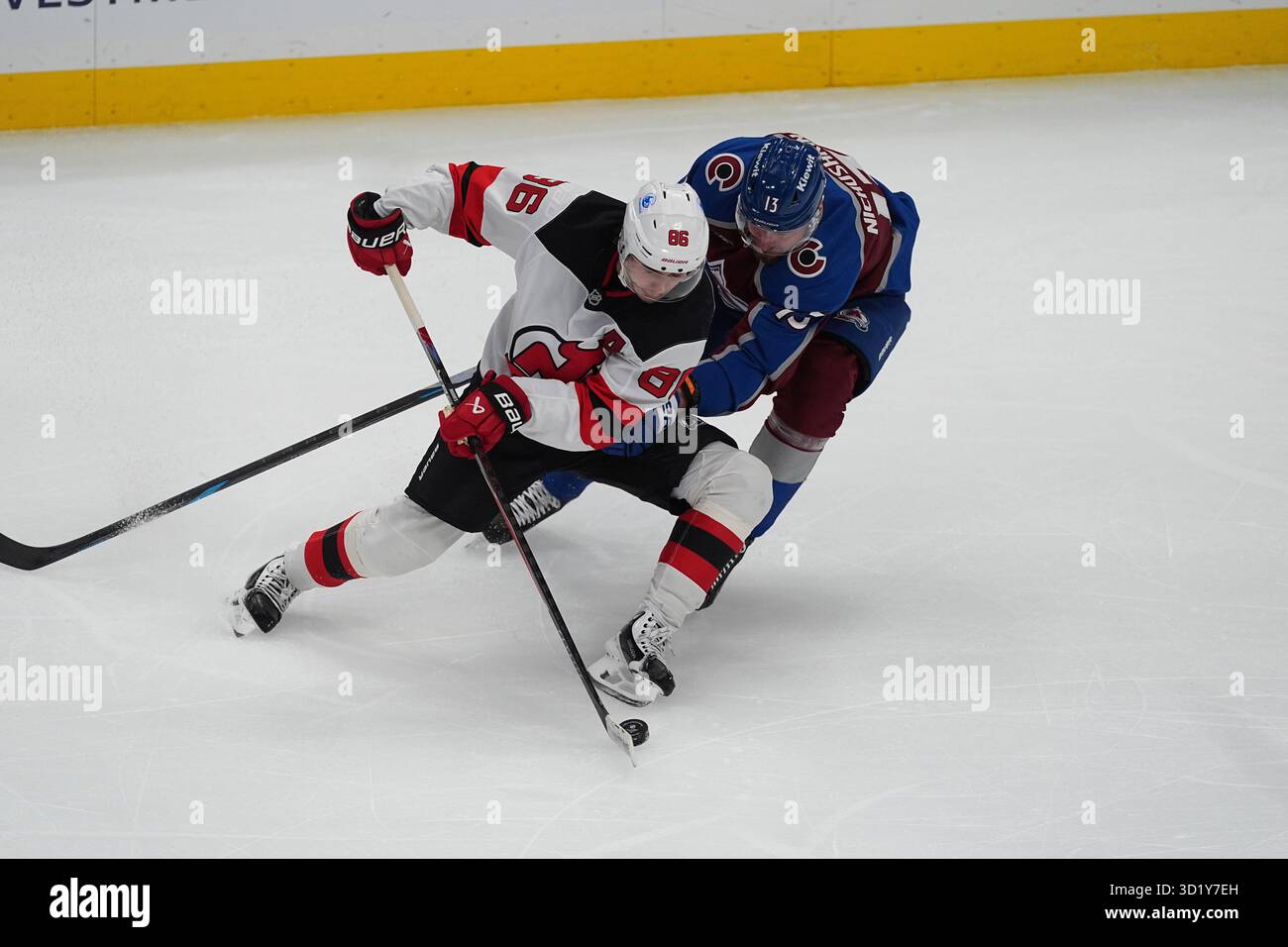 New Jersey Devils center Jack Hughes (86) and Colorado Avalanche right ...