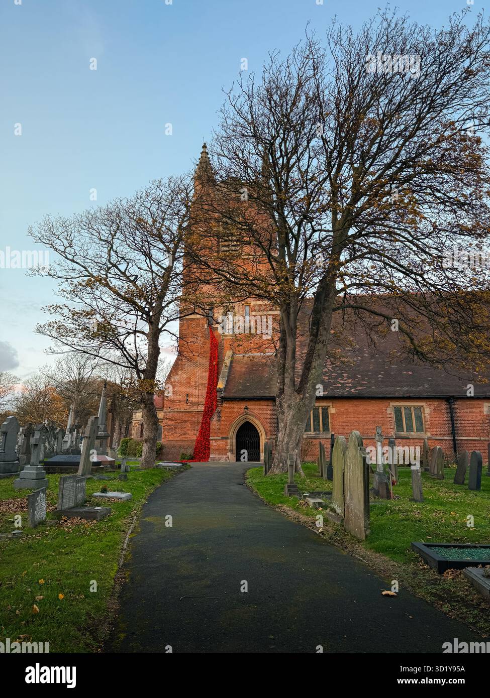 Aerial of St Annes Parish Church with red poppy cascade for Remembrance ...