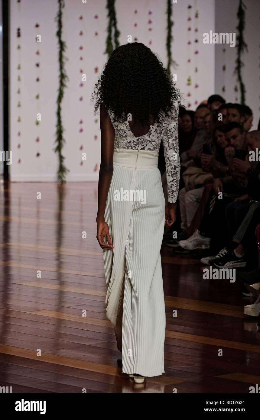 Madrid, Spain. 29th Oct, 2025. A model walks the catwalk during the ...