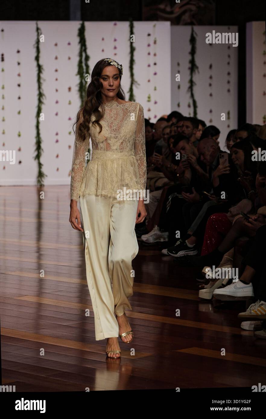 Madrid, Spain. 29th Oct, 2025. A model walks the catwalk during the ...
