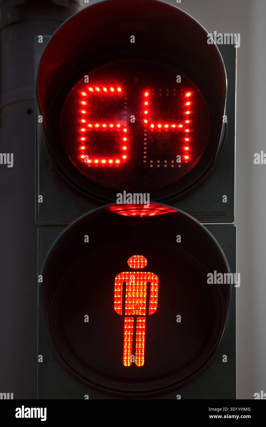 Red pedestrian traffic light with second display of the red phase ...