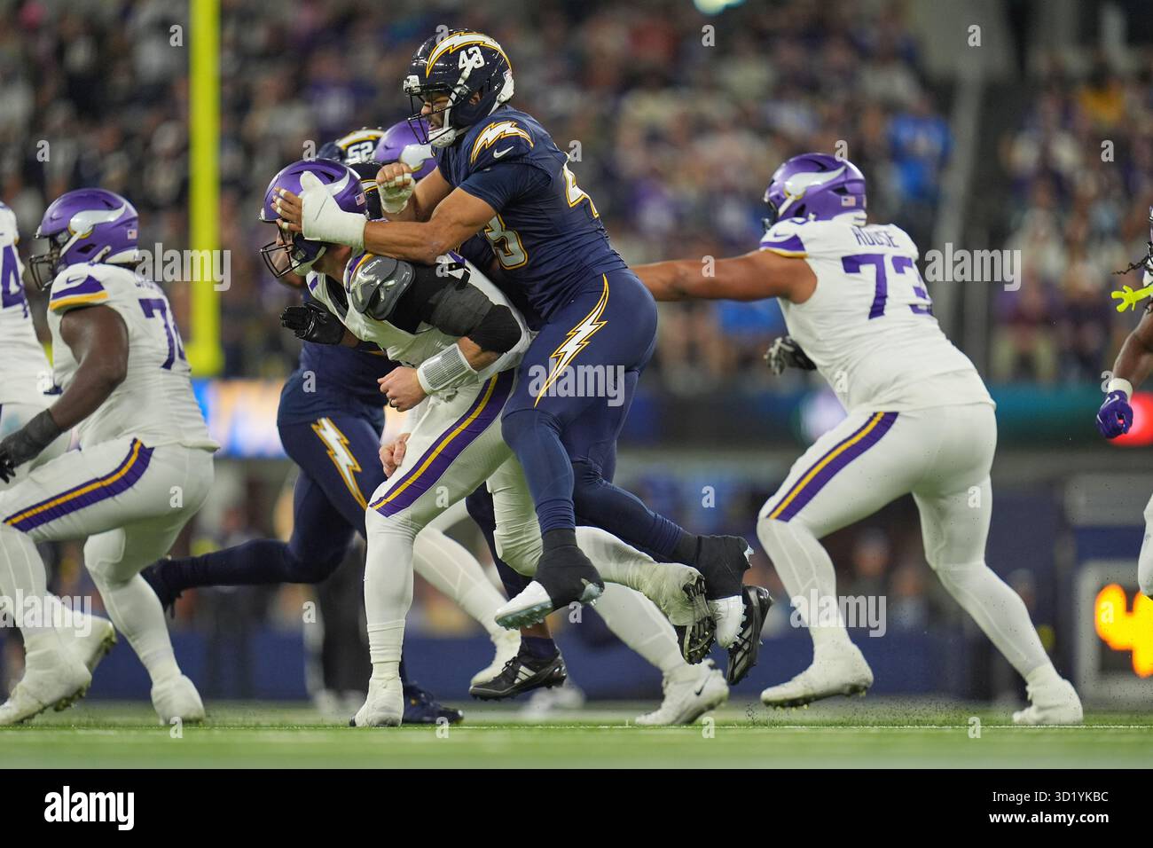 Minnesota Vikings quarterback Carson Wentz is hit by Los Angeles ...